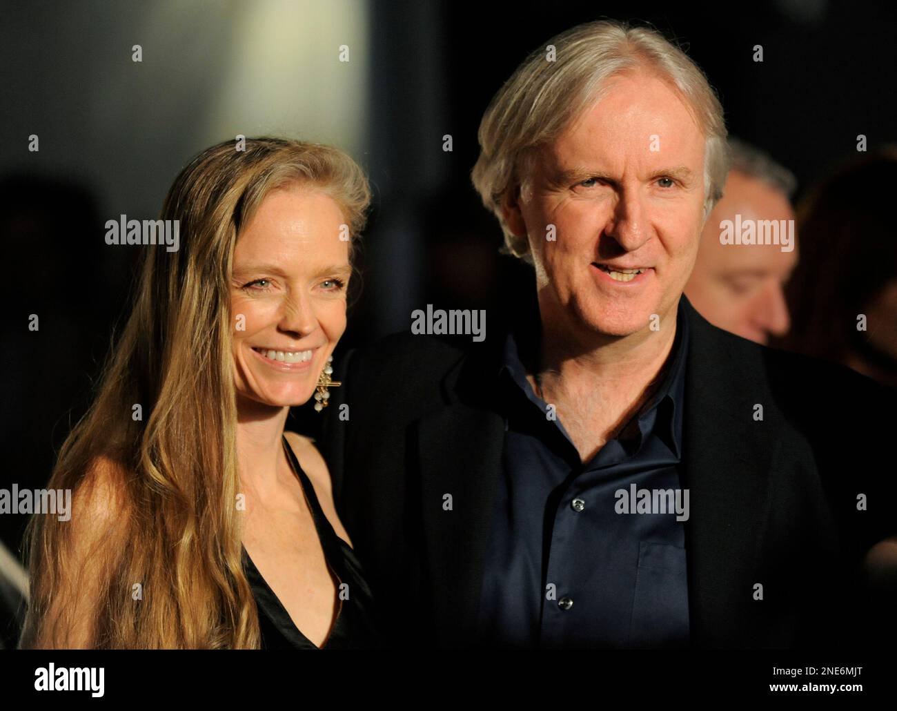 "Avatar" director James Cameron, right, and his wife Suzy Amis Cameron ...