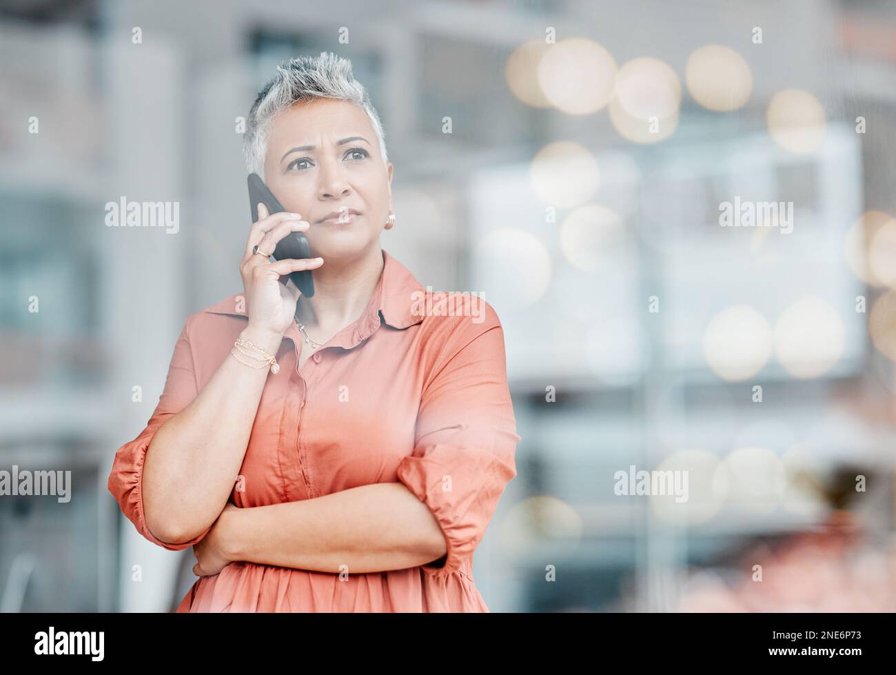 Sad, phone call and senior business woman talking, chatting or speaking ...