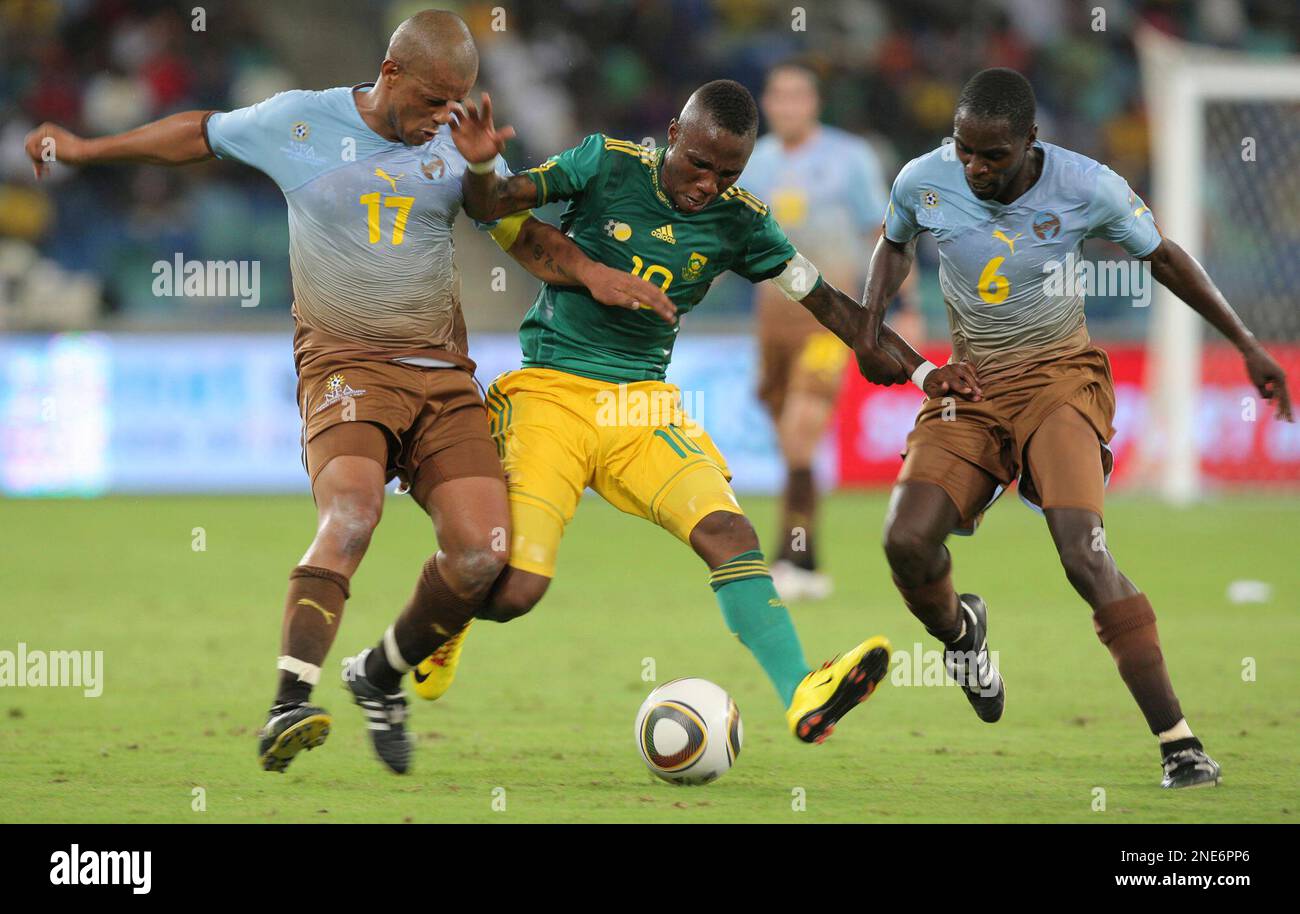South Africa's Teko Modise, centre, works his way past Namibia's ...