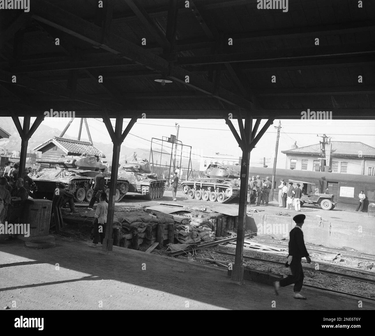 U.S. medium tanks damaged in action against North Korean invaders, are ...