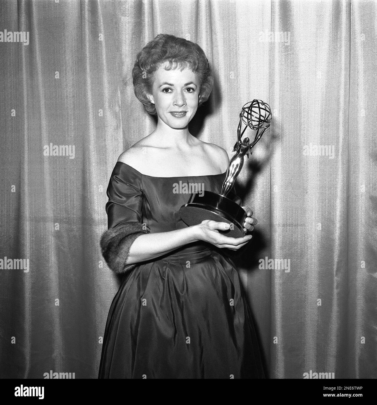 Actress Piper Laurie poses with Emmy she accepted for Roddy McDowall ...