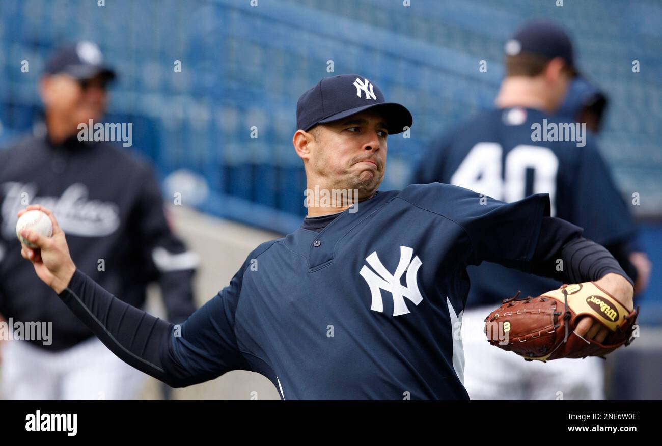 New York Yankees Javier Vazquez throws long toss before the Yankees ...