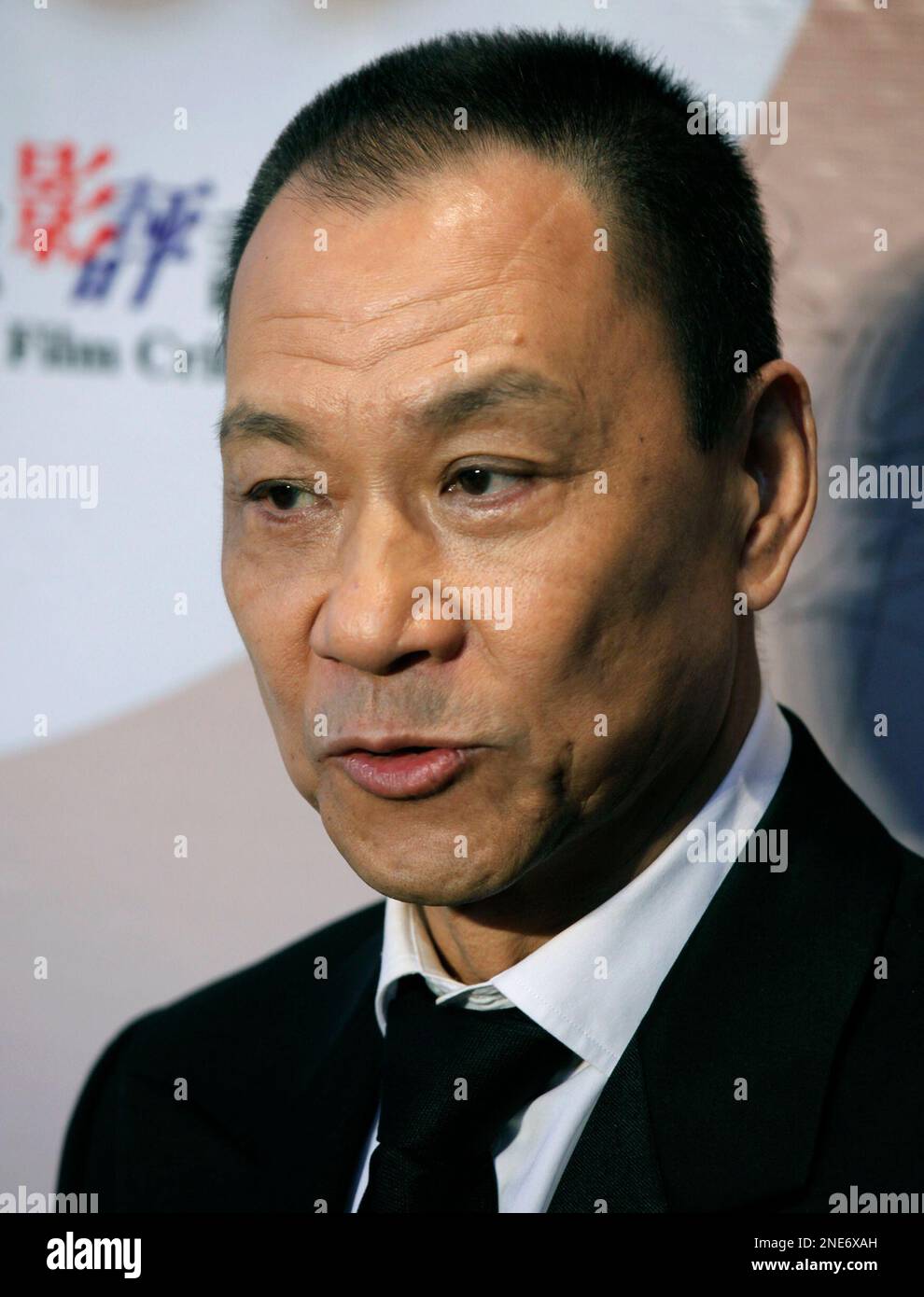 Chinese actor Wang Xueqi poses after winning the best actor award for ...