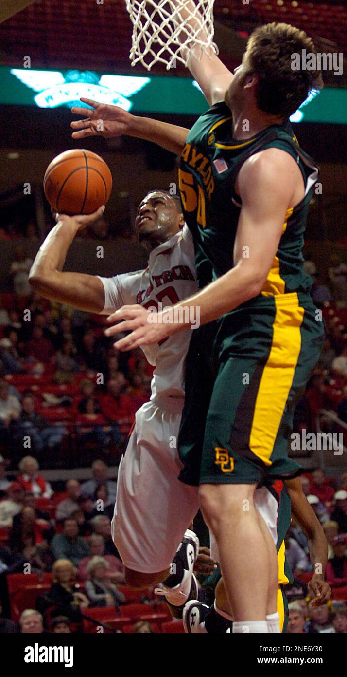 Baylor's Josh Lomers, right, rejects a shot from Texas Tech's Mike ...