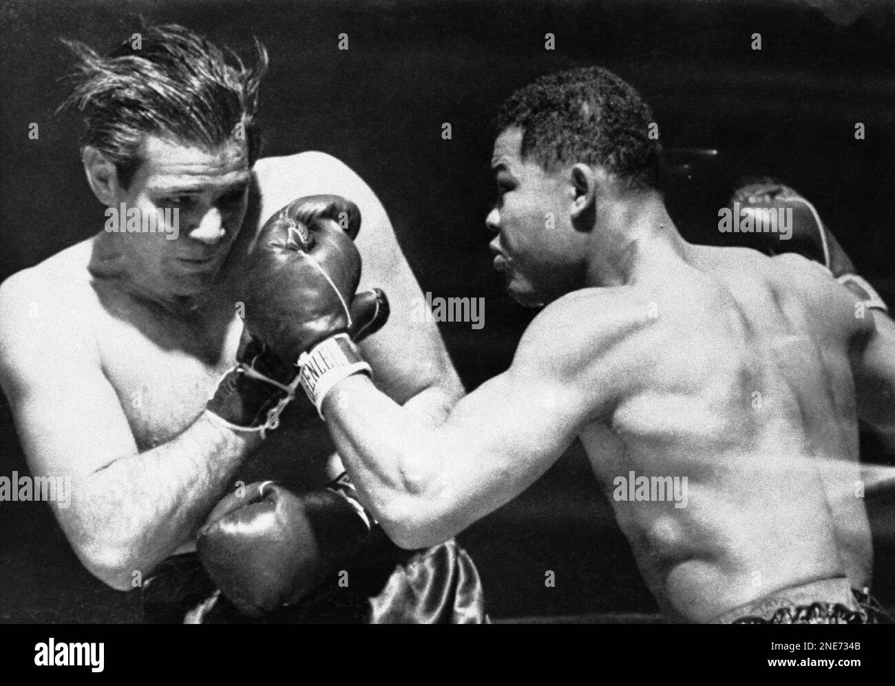 American boxer Buddy Baer, left, uses his glove to block a left-handed blow by champion Joe ...