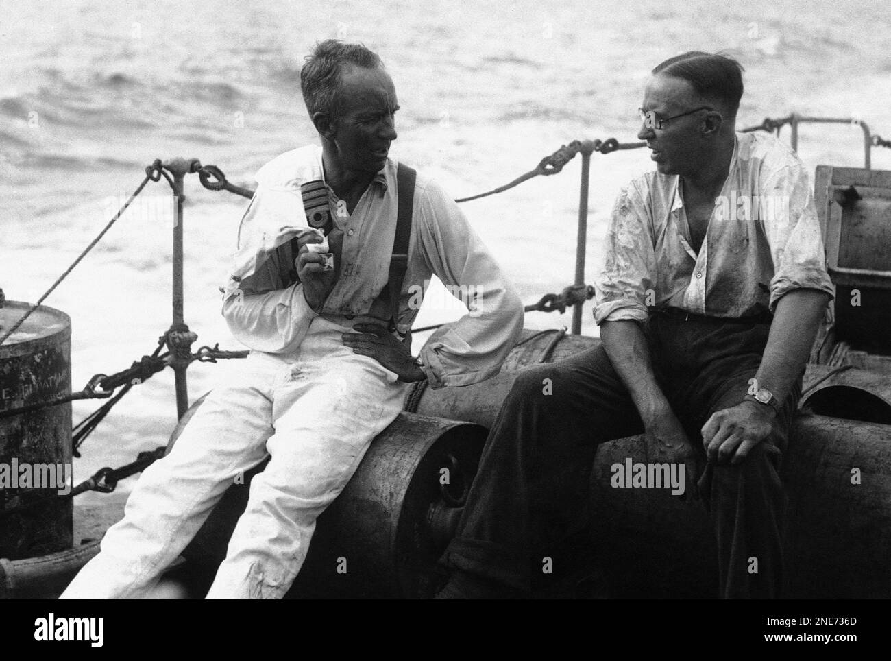 Captain William Tennant of the Repulse, left, talking to the Repulse’s ...