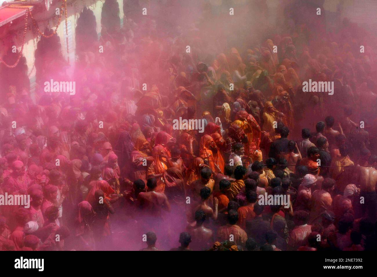 Women hit men with whips made of cloth, torn apart from men's clothing ...