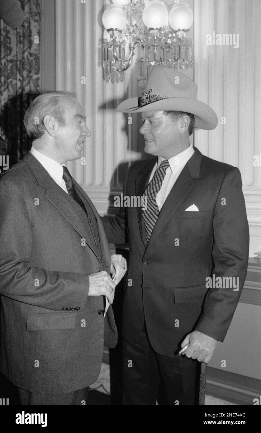 Actor Larry Hagman dons a cowboy hat presented by Rep. Jim Wright, D ...