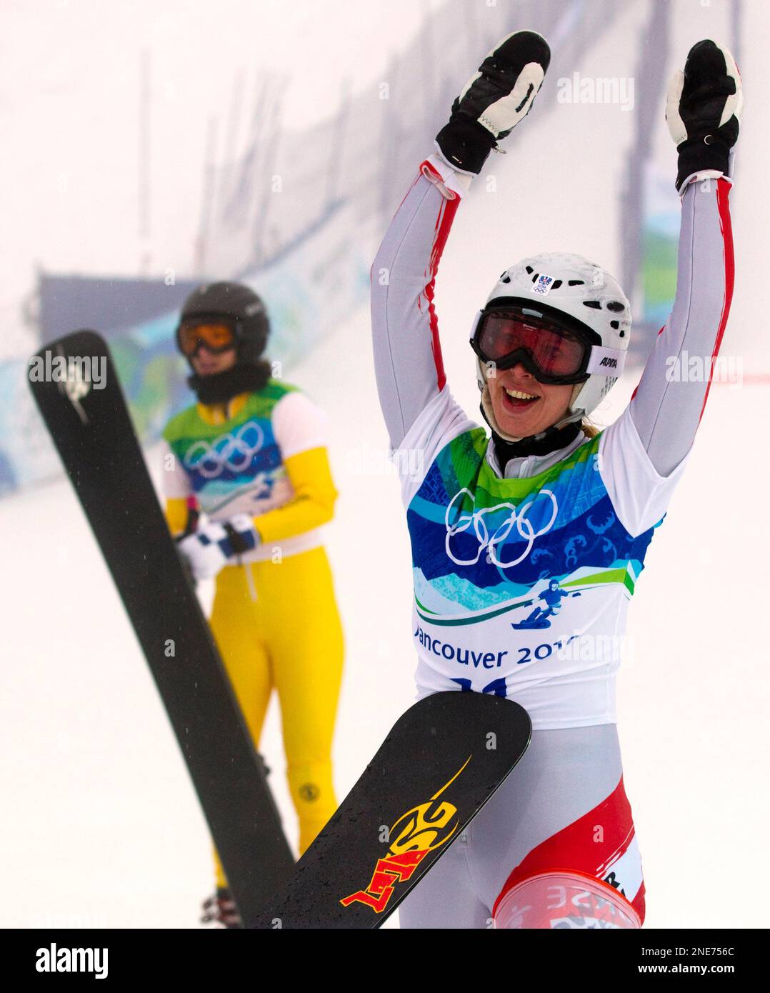 Bronze medalist Marion Kreiner of Austria, right, celebrates, after ...