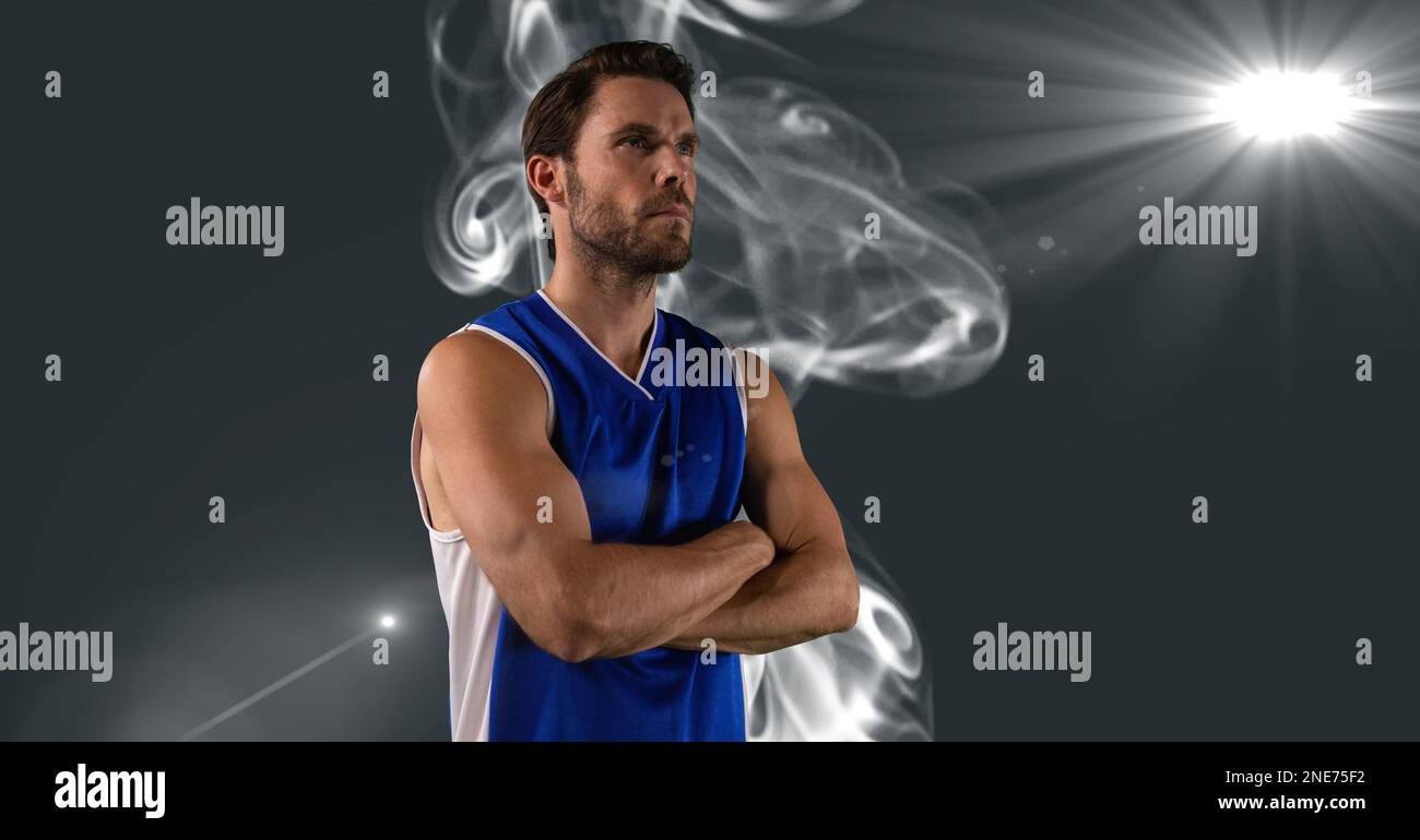 Composition of male basketball player with arms crossed with copy space ...