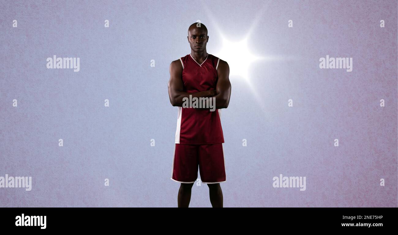 Composition of male basketball player with arms crossed with copy space ...