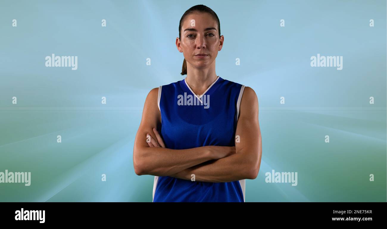 Composition of female basketball player with arms crossed with copy ...