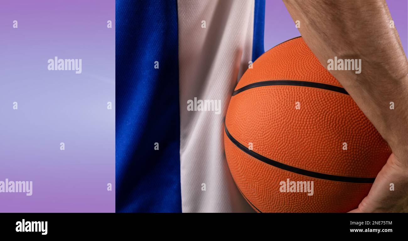 Composition of male basketball player holding basketball with copy ...