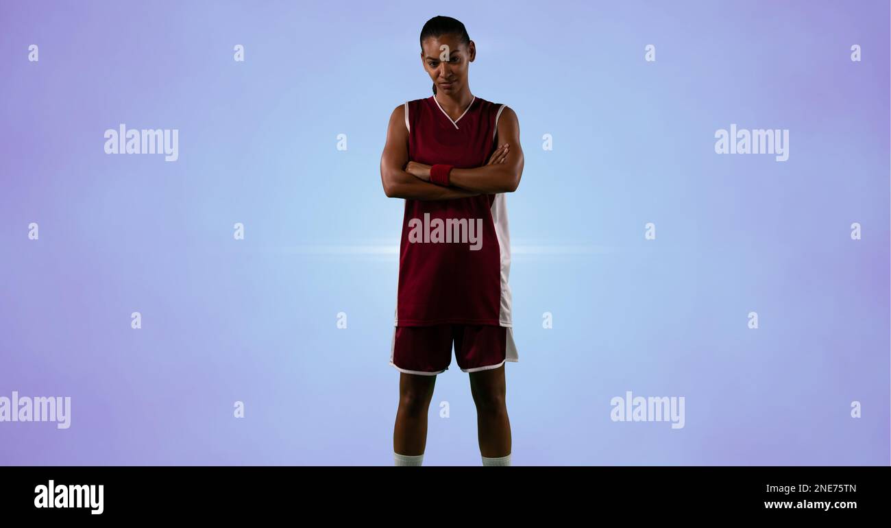Composition of female basketball player with arms crossed with copy ...