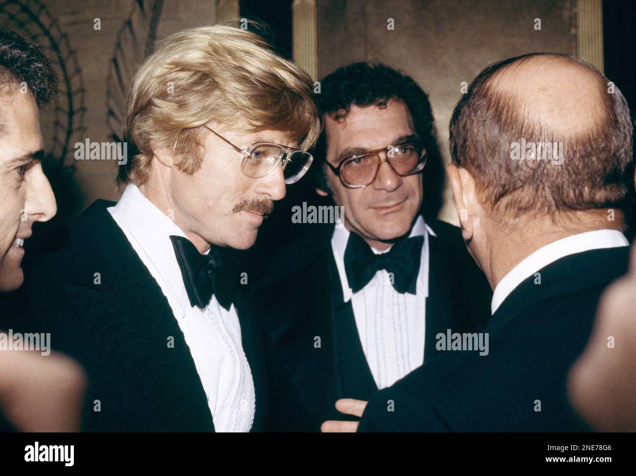 Actor Robert Redford and Sydney Pollack with unidentified people at ...