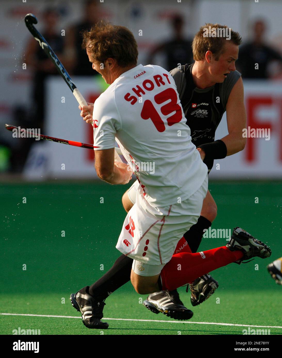New Zealand's Hugo Inglis, right, vies for the ball with Canada's Rob ...