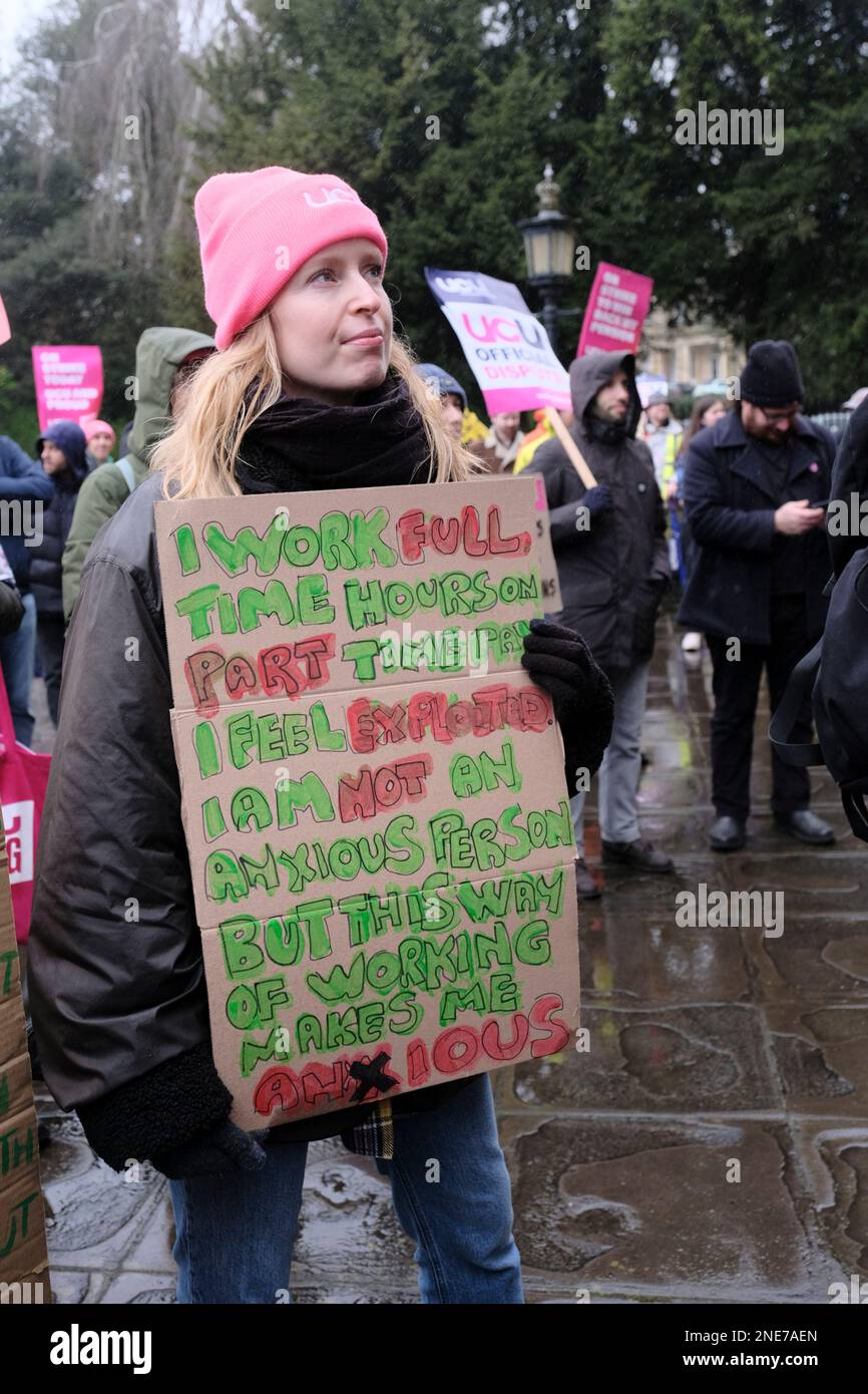 Bristol, UK. 16th Feb, 2023. A striking UCU members holds a placard ...