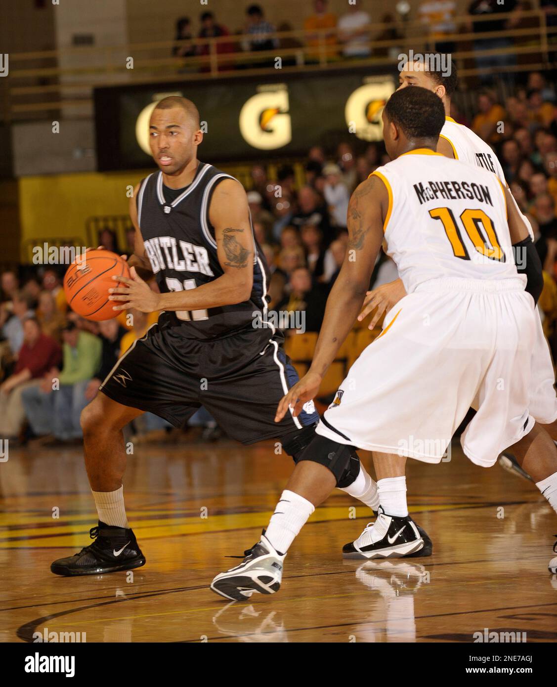 Butler guard Willie Veasley, left, drives the lane as Valparaiso guard ...