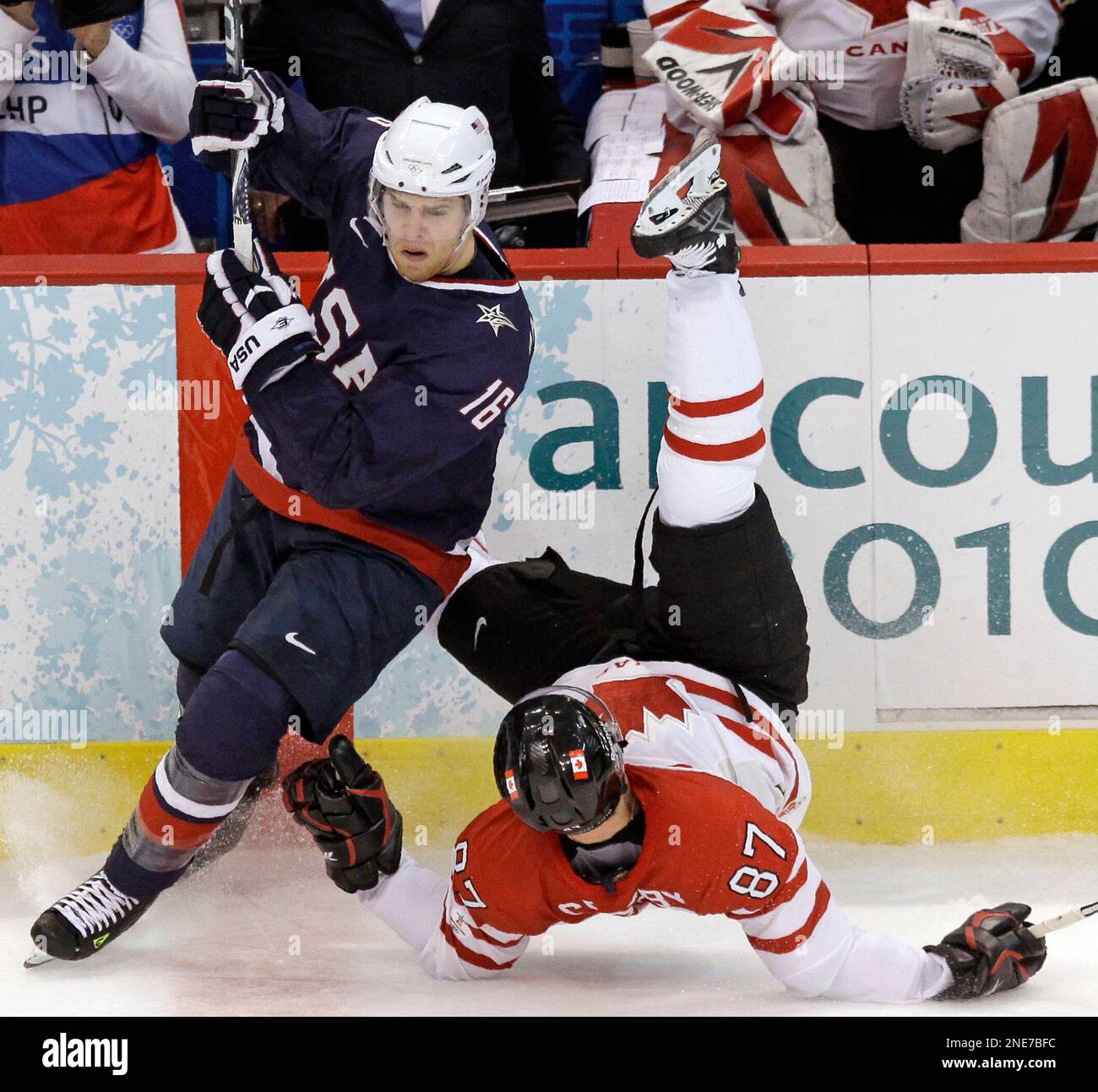 USA's Joe Pavelski (16) and Canada's Sidney Crosby (87) go after a puck ...