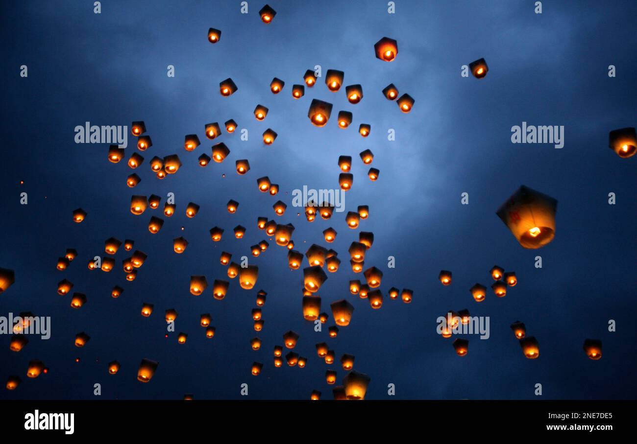 Lanterns float up into the sky to welcome the Chinese Lantern Festival ...
