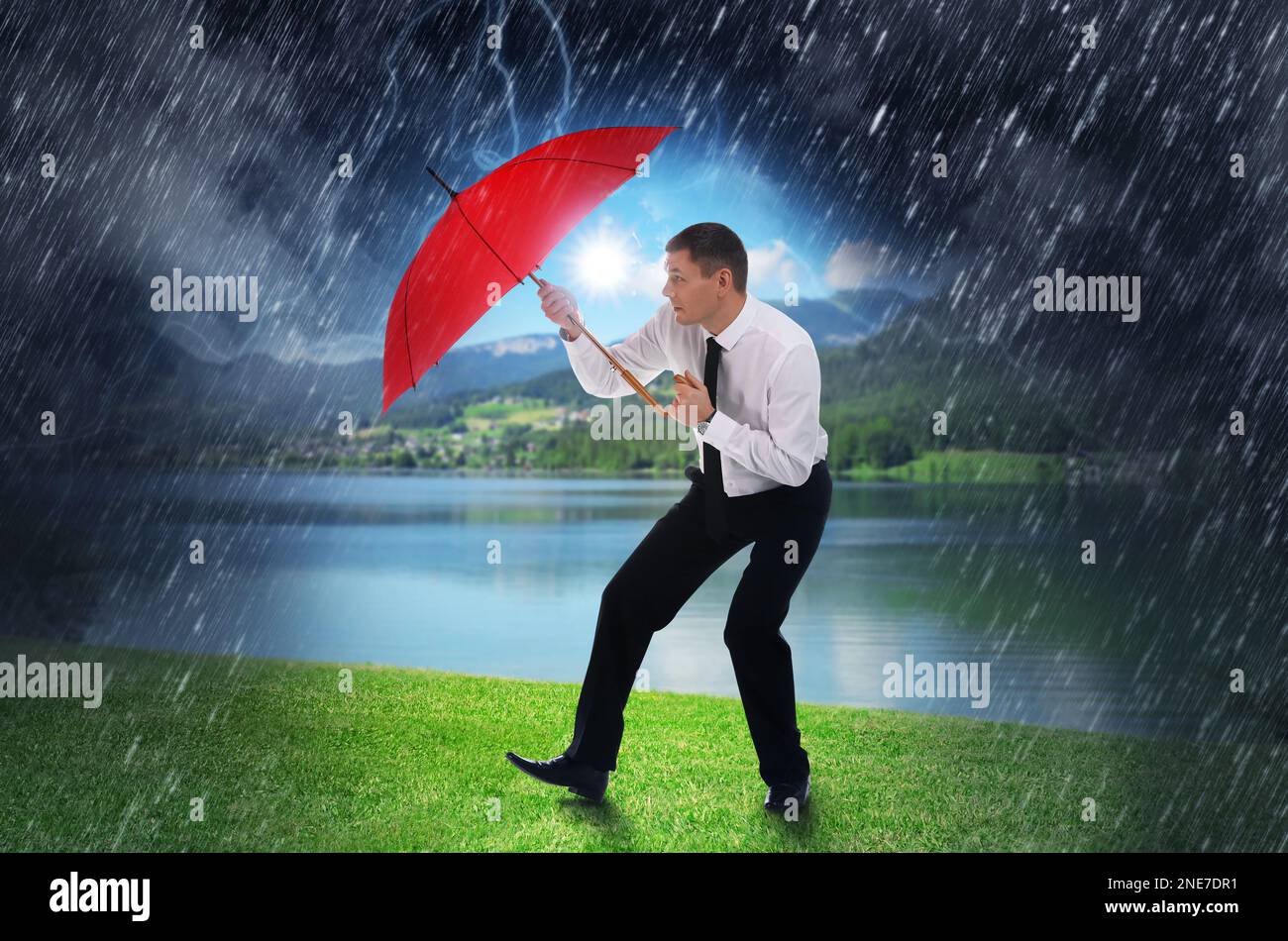 Man heavy rain hiding hi-res stock photography and images - Alamy