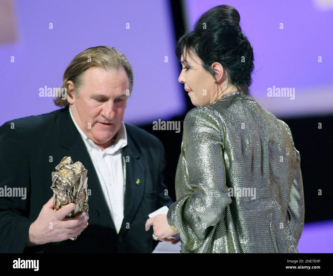 French actress Isabelle Adjani reacts on stage after receiving the Best ...