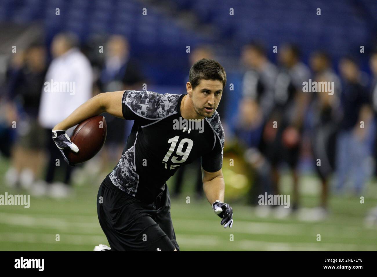 BYU's Dennis Pitta runs a drill at the NFL football scouting combine in ...