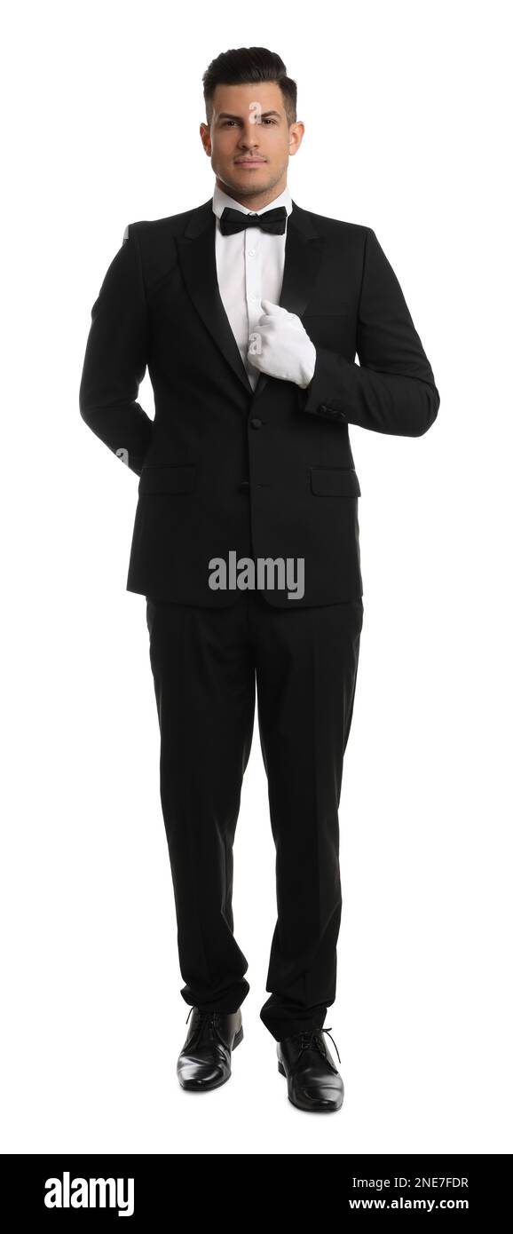 Handsome butler in elegant uniform on white background Stock Photo - Alamy