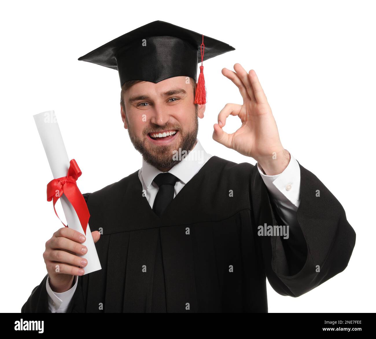 Happy student with graduation hat and diploma on white background Stock ...