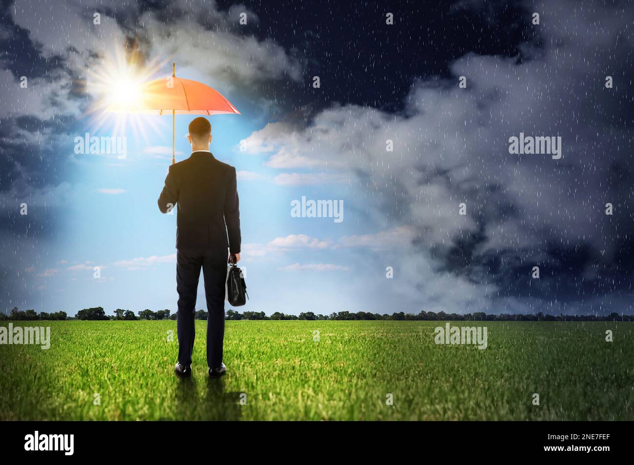 Man heavy rain hiding hi-res stock photography and images - Alamy