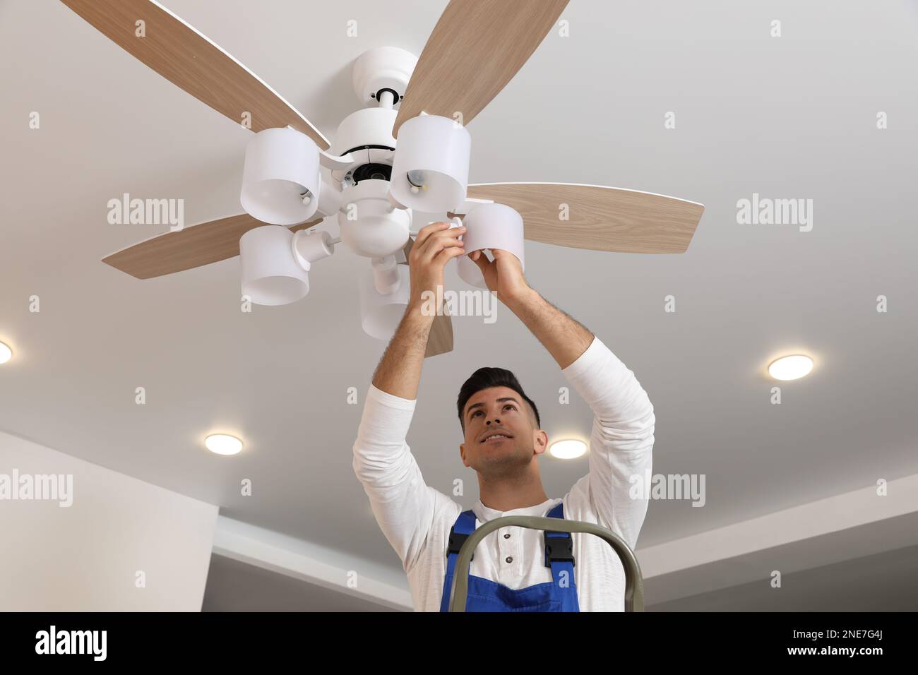 Changing lightbulb ladder hi-res stock photography and images - Alamy