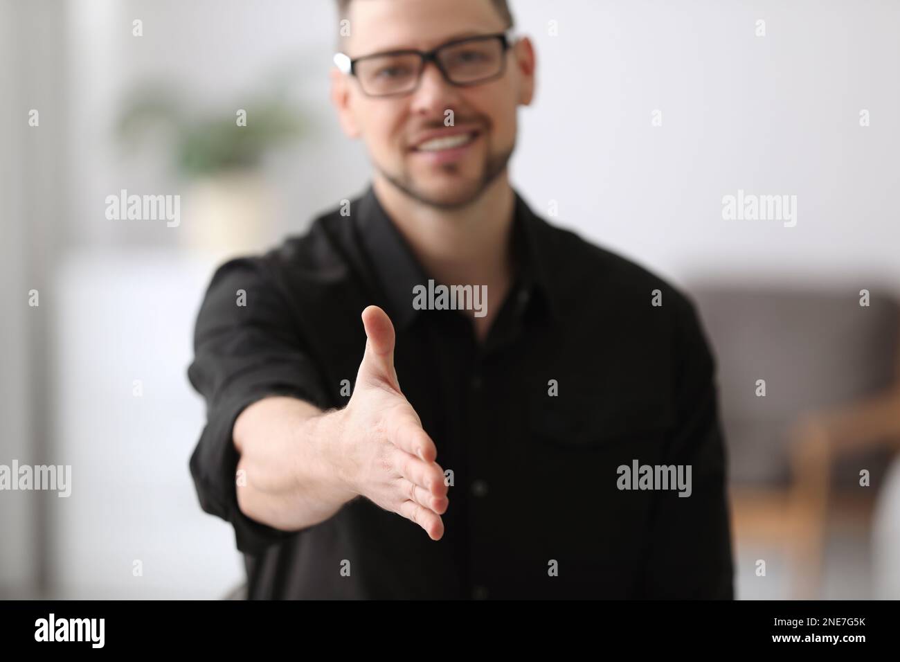Businessman reaching out for handshake indoors, focus on hand Stock ...