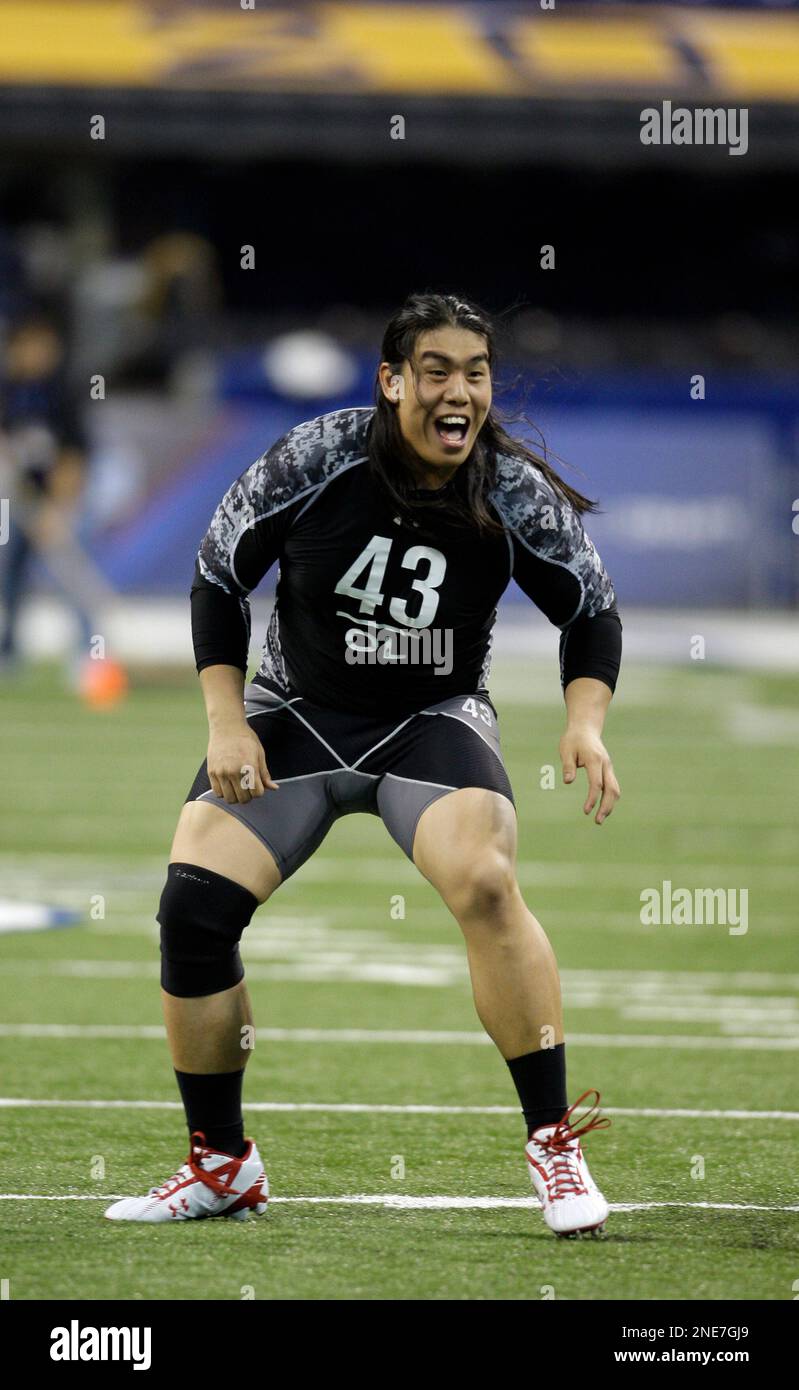 Virginia Tech's Ed Wang runs a drill at the NFL football scouting ...