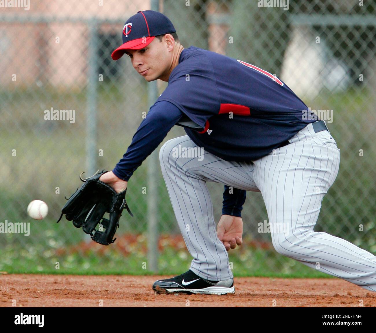Minnesota Twins infielder Danny Valencia fields a ball on the first day ...