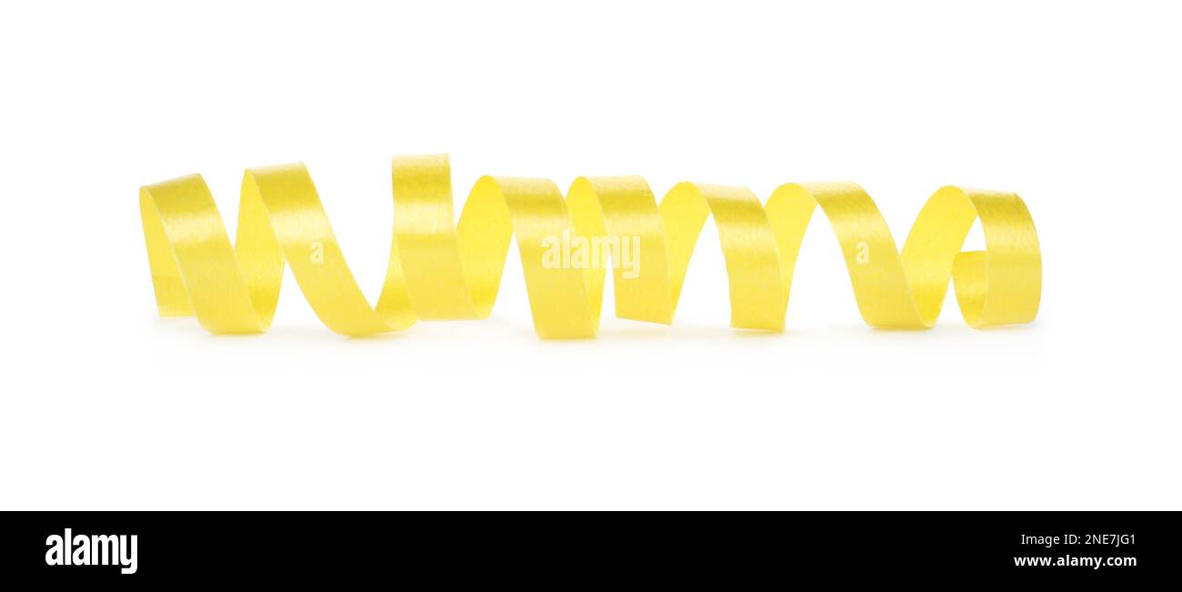 Shiny yellow serpentine streamer on white background Stock Photo - Alamy