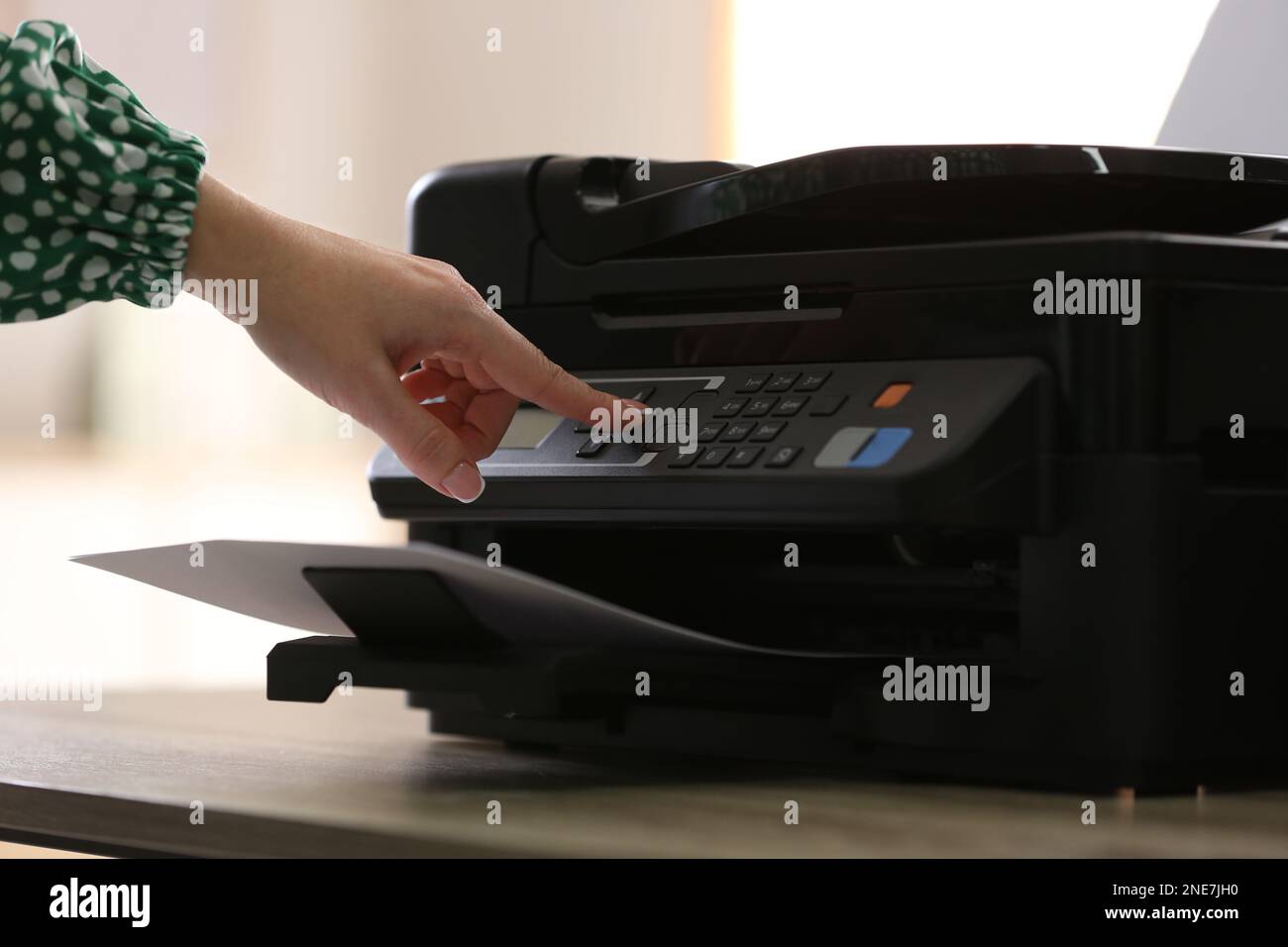 Person using multifunction printer hi-res stock photography and images ...