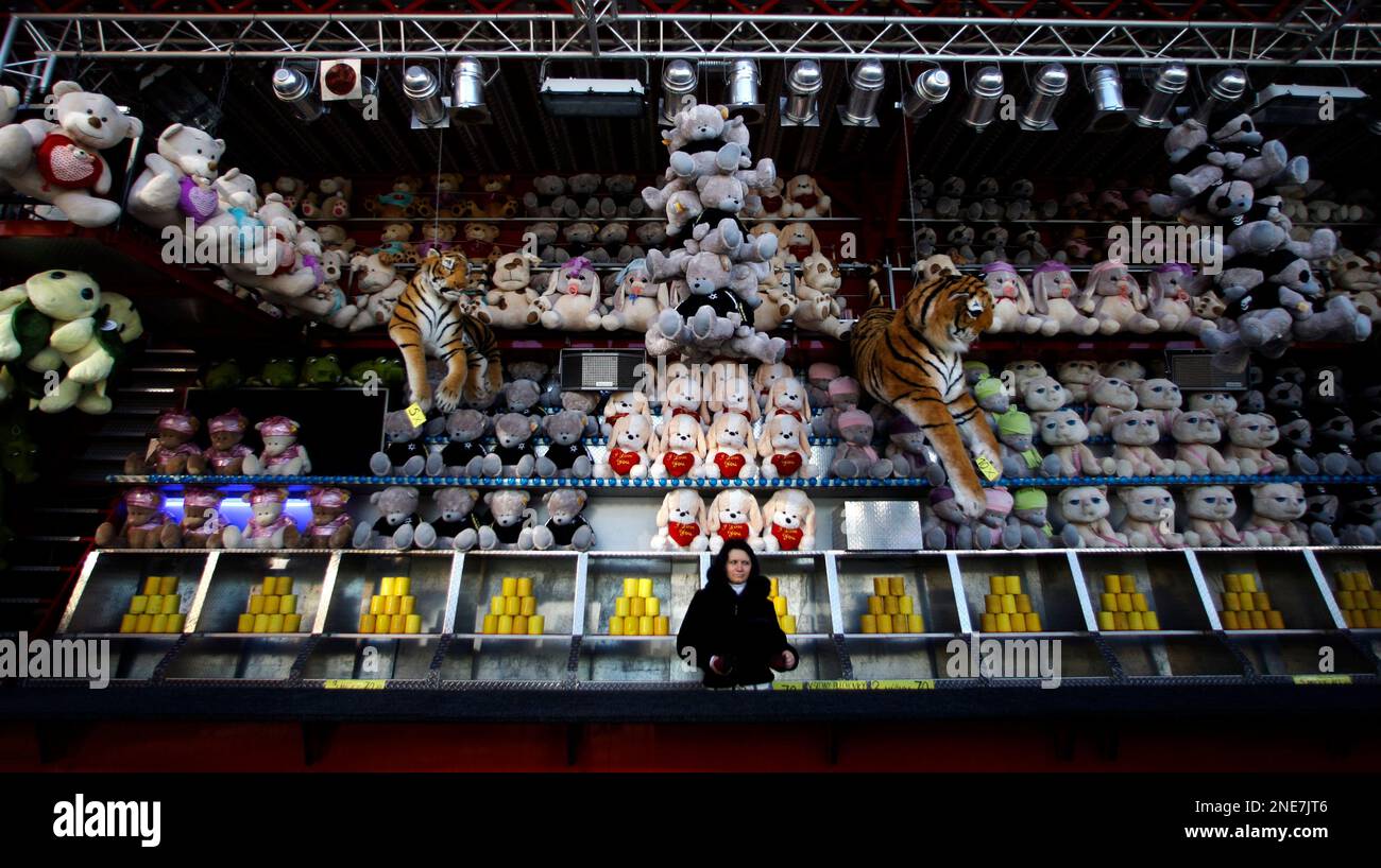 A vendor waits for customers at the traditional Matejska Pout amusement ...