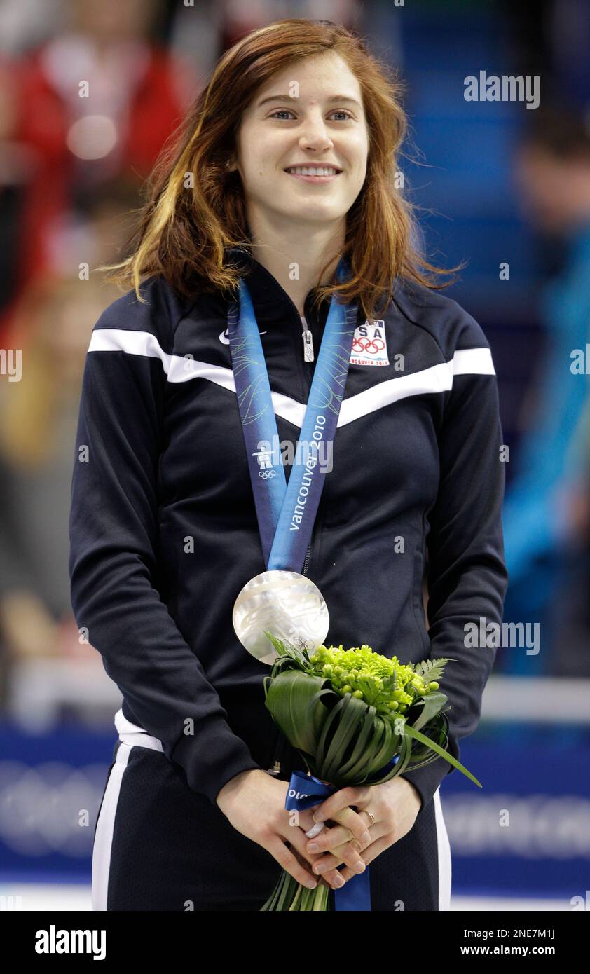 USA's Katherine Reutter poses on the podium after winning the silver ...