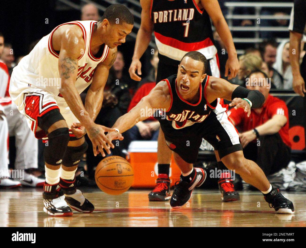 Chicago Bulls' Derrick Rose scrambles for the loose ball with the ...