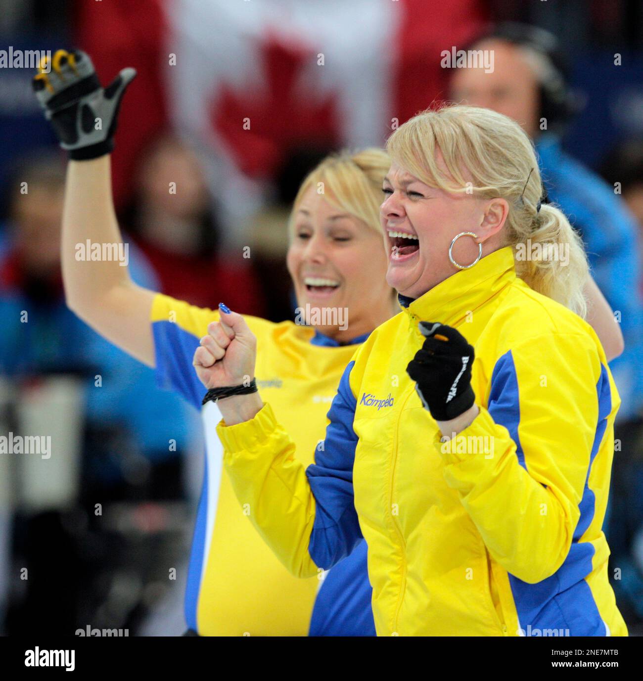 Sweden's Eva Lund, left, and Anette Norberg celebrate after the gold ...