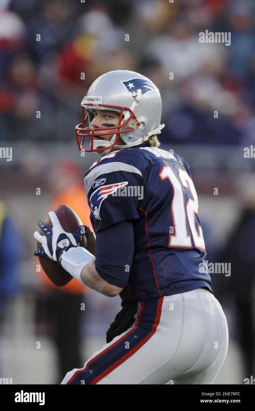 New England Patriots quarterback Tom Brady (12) looks for a receiver ...