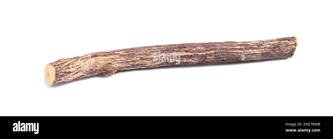 Dried stick of liquorice root isolated on white Stock Photo - Alamy