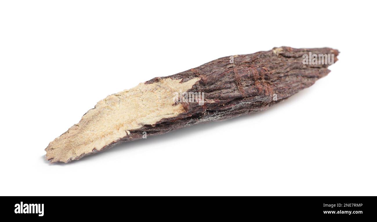 Dried stick of liquorice root isolated on white Stock Photo - Alamy
