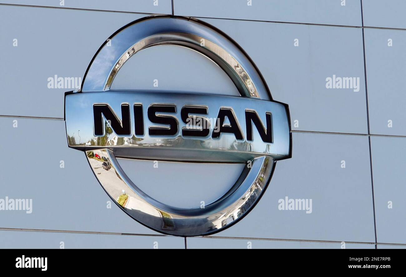 The Nissan sign is shown at a local dealership in Miami, Friday, Feb ...