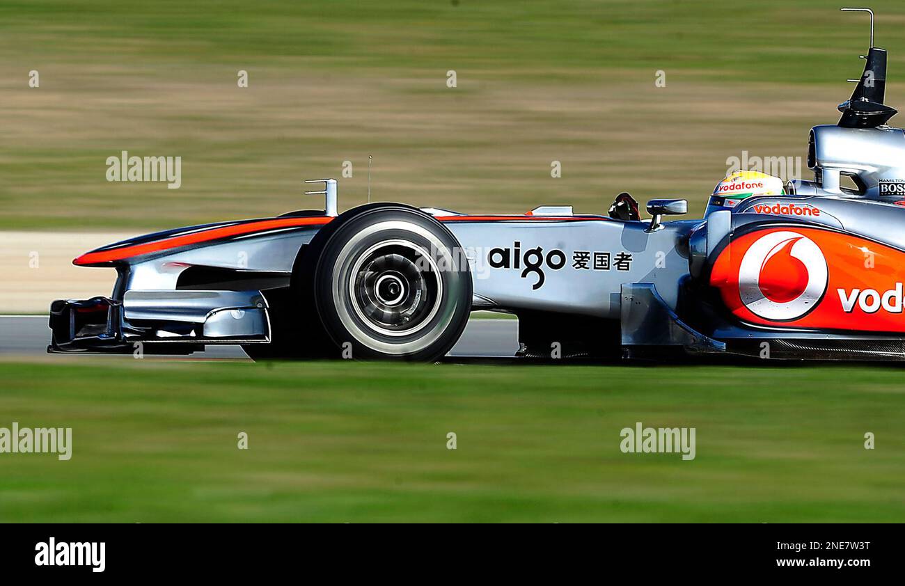 McLaren Formula One driver Lewis Hamilton of Great Britain steers his ...