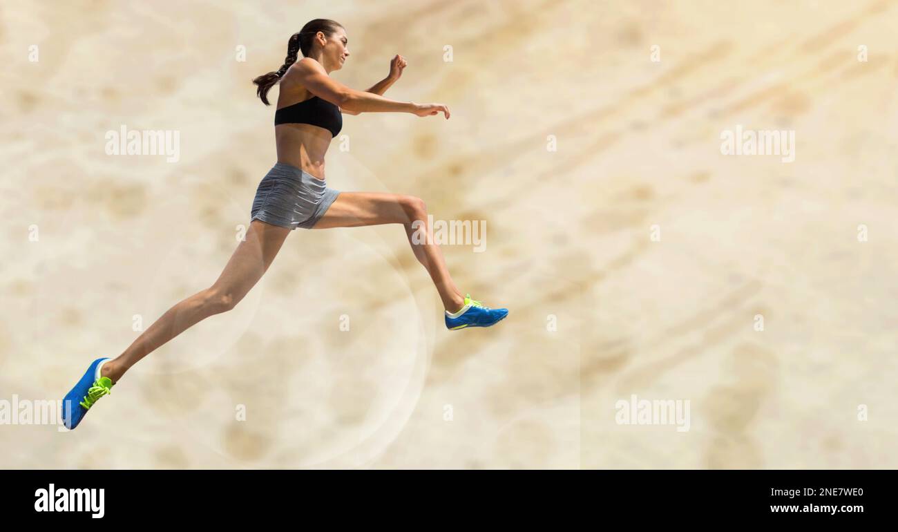 Composition of female female long jumper with copy space on yellow ...
