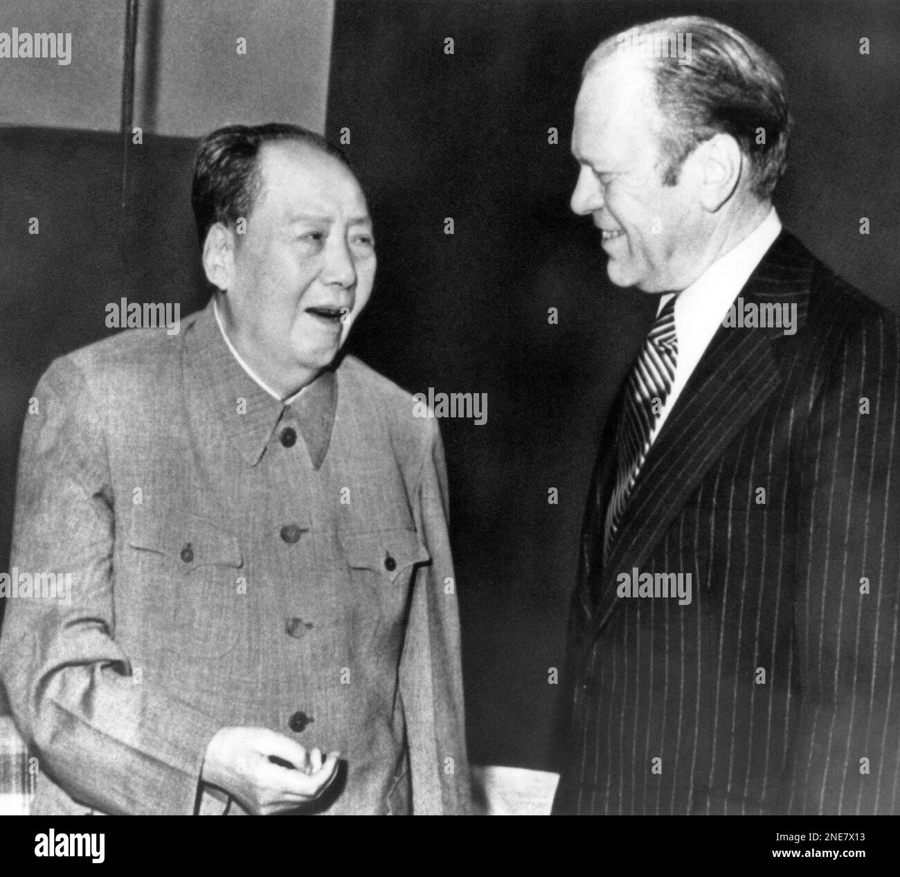 Chairman Mao Tse-tung with President Gerald Ford in Beijing on December ...