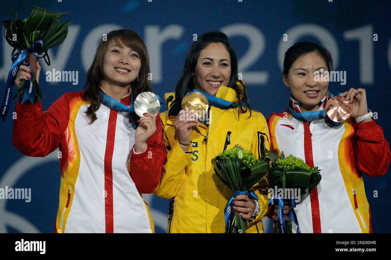 China's silver medal winner Nina Li, left, Australia's gold medal ...