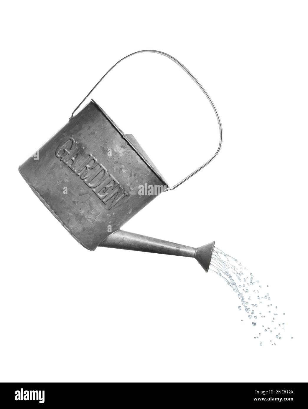 Pouring liquid from watering can on white background Stock Photo - Alamy