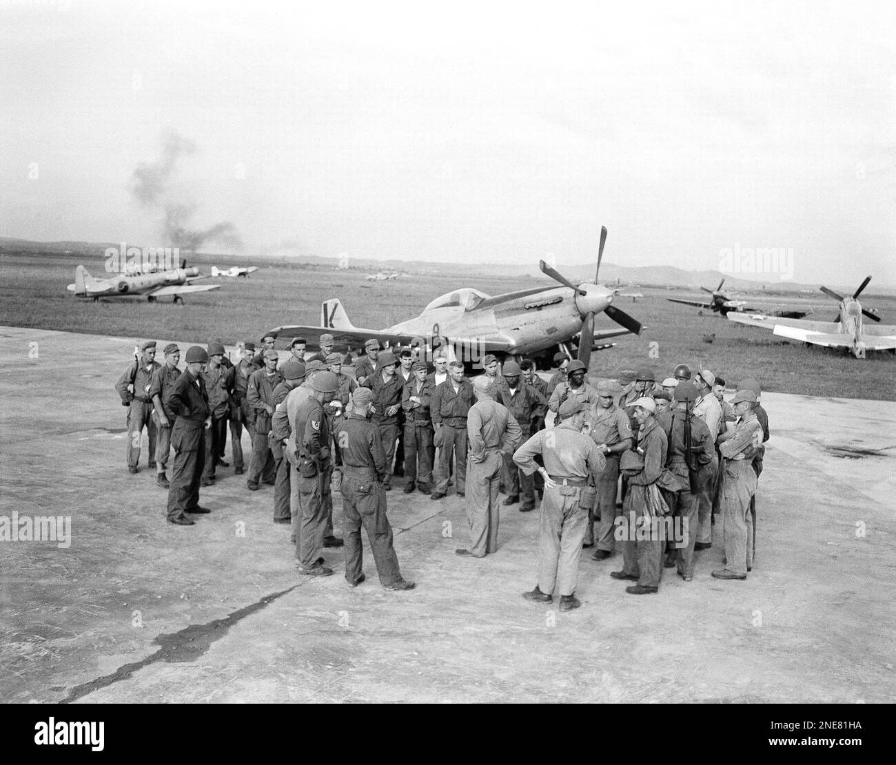 Capt. F. E. Peebles (center, hands on hips), of San Antonio, Texas ...